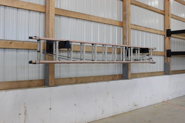 Ladder storage on post-rack brackets – Scott Systems